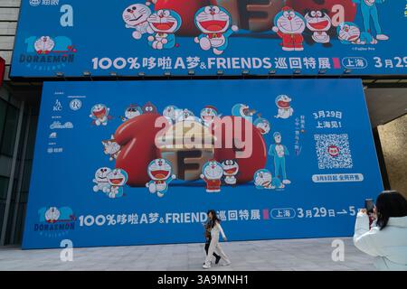 People visit a Doraemon exhibition in Shanghai, China, 31 March, 2025 ...