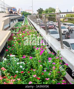 The modern, raised pedestrian walkway over the vehicle intersection in ...