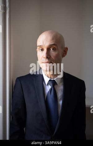 Portrait of lawyer of Anne Vedovini, Julien Pinelli in his office in ...