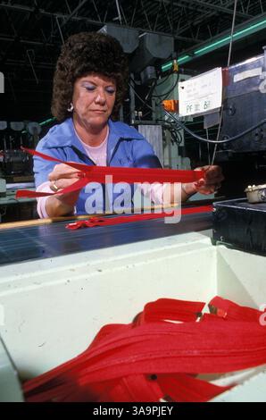 Oct 10, 1985; Macon, GA, USA; Inspecting zippers at YKK Zipper factory ...