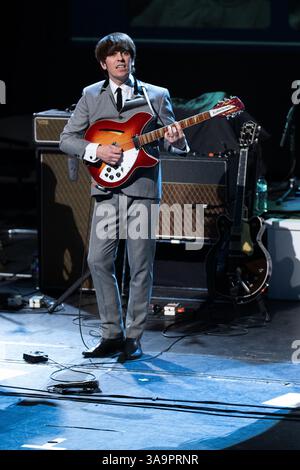Stephen Hill, left, as George Harrison, Reuven Gershon, second left, as ...