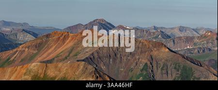 The vibrant orange colors of Mount Baldy (12,805') in the Elk range ...