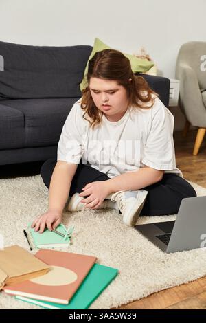 Woman writing down tasks Stock Photo - Alamy