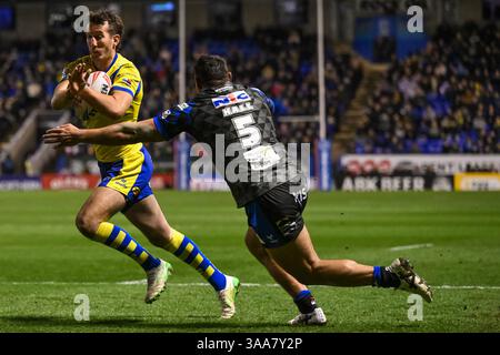 Warrington Wolves' Stefan Ratchford and Ryan Atkins stop Huddersfield ...