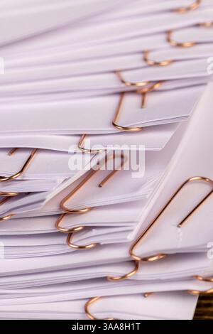joined together white sheets of cellulose paper for records, stapled ...