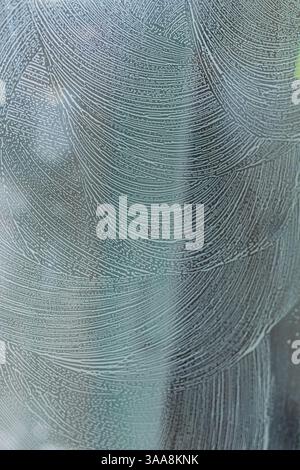 soap foam pattern wipe marks on window glass, window cleaning , blue ...