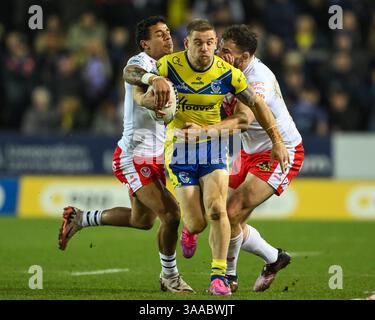 Matt Dufty of Warrington Wolves breaks with the ball during the Betfred ...