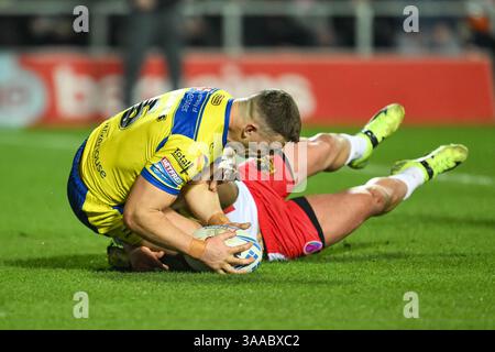 George Williams #7 of Warrington Wolves goes over for a try in, on 2/17 ...
