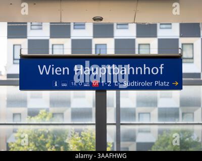 Vienna central station Hauptbahnhof sign on train platform, at night ...