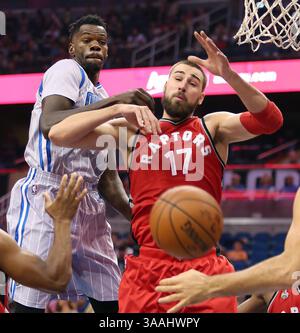 Toronto Raptors' Jonas Valanciunas (17) and Washington Wizards' Nene ...