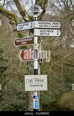 Various metal UK British road signs including 'temporary obstruction 15 ...