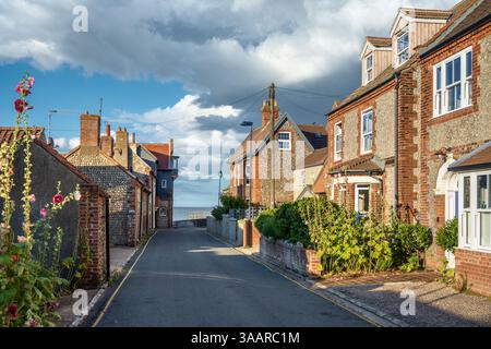 Traditional flint houses in the village of Cley Next The Sea, North ...