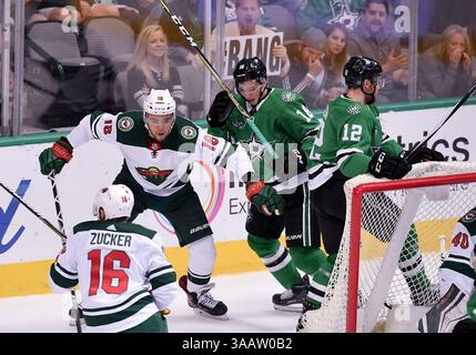 Minnesota Wild center Tyler Pitlick (19) skates with the puck while ...