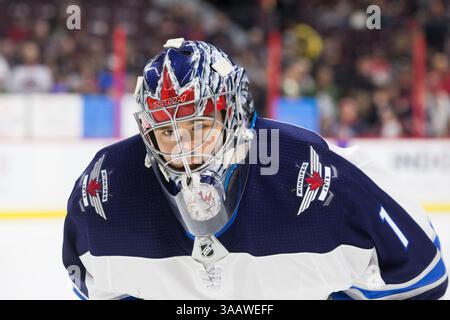 Winnipeg Jets goaltender Eric Comrie (1) in action during the third ...