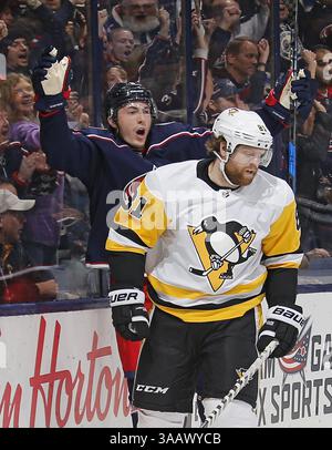 Columbus Blue Jackets' Zach Werenski (8) chases Edmonton Oilers' Jack ...