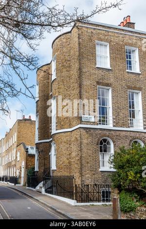 A Georgian residential property with curved bow windows on the corner ...