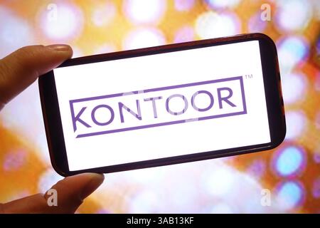 In this photo illustration, the Kontoor Brands logo is seen displayed ...