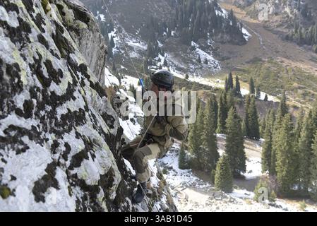 The hunting service trains on the rocks in the highlands Stock Photo ...