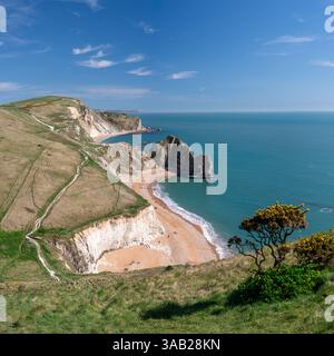 The distinctive rocky arch of Durdle Door, seen from one of a series of ...