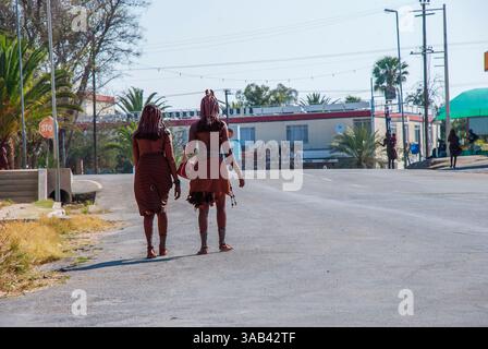 Womans of the Himba tribe walking on the streets of Outjo town, Namibia ...