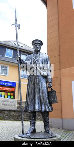 Sculpture and statue of the historic night watchman with dog and lance ...
