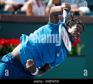 March 11, 2018 Gael Monfils (FRA) returns a shot against John Isner ...