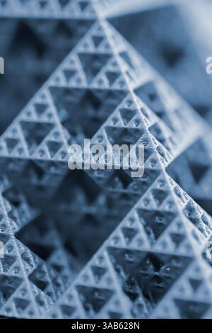 Small model of pyramid printed on 3D printer close-up. Object created ...
