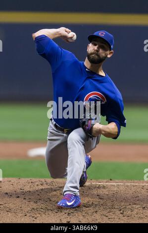 Chicago Cubs' Tyler Chatwood delivers during baseball practice at ...