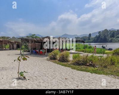 Beach shack at the mouth of the Rio Don Diego, Sierra Nevada de Santa ...