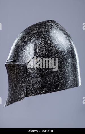 Darkened Steel Medieval Knight Helmet. Battle-worn head protection with ...