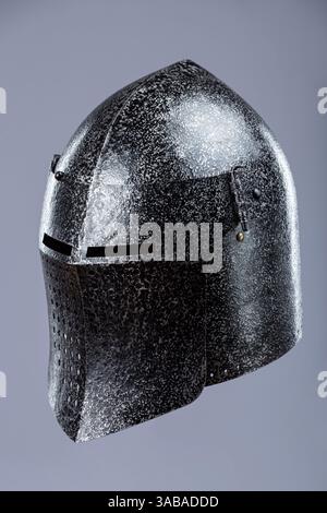 Darkened Steel Medieval Knight Helmet. Battle-worn head protection with ...