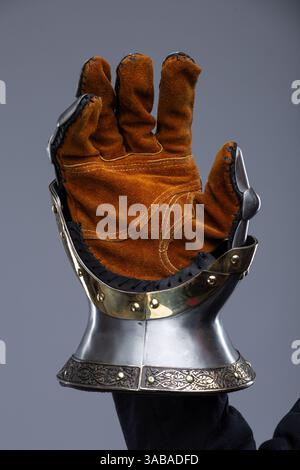 Silver Hourglass Gauntlets with Brass Details. This image shows a close ...