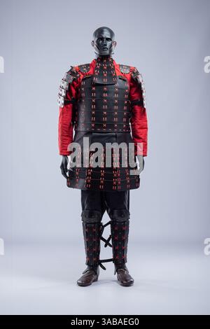 Full Black and Red Leather Armor Set on Mannequin. Warrior costume with ...