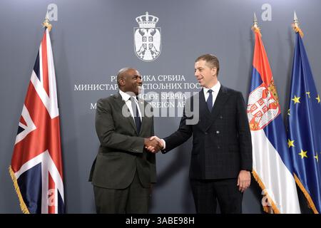 Serbian Foreign Minister Marko Djuric listens to his German counterpart ...