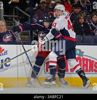 Columbus Blue Jackets' Zach Werenski (8) chases Edmonton Oilers' Jack ...
