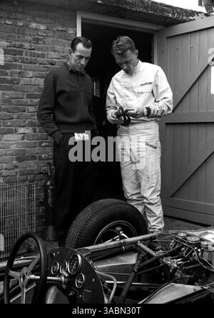 Second place finisher Dan Gurney (USA) Porsche 718 leads Stirling Moss ...
