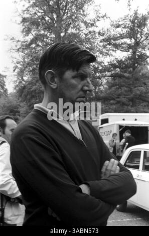 L to R): Ken Tyrrell (GBR) Tyrrell Team Owner talks with Max Mosley ...