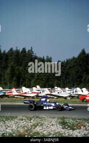 Jody Scheckter (RSA) Tyrrell 007 celebrates victory on the JPS mobile ...