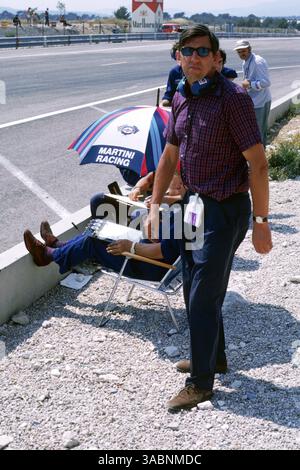 L to R): Ken Tyrrell (GBR) Tyrrell Team Owner talks with Max Mosley ...
