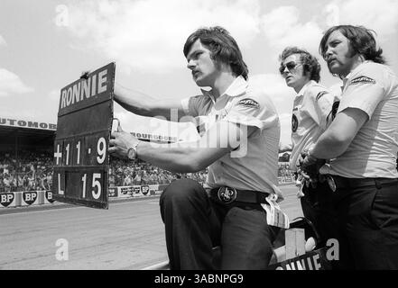 The Lotus team hold out pit boards for race winner Mario Andretti (USA ...