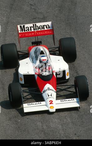 Alain Prost (FRA) McLaren MP4/5 finished fourth. He leads Derek Warwick ...