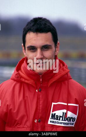 Laurent Aiello (FRA) Pacific Racing Reynard-Mugen 92D, leads a train of ...