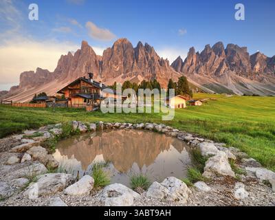 Geisleralm with Geisler group and alpenglow, reflection, Dolomites ...