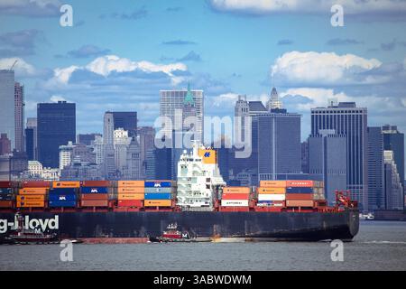 New York, US - March, 27 2025: Large container ship with import ...