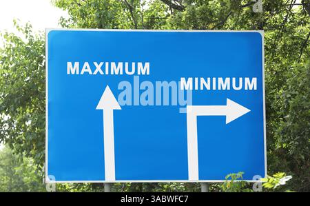 Road sign with different directions - Maximum or Minimum outdoors Stock ...