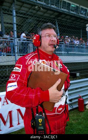 Ross Brawn (GBR) Ferrari Technical Director whispers to Michael ...