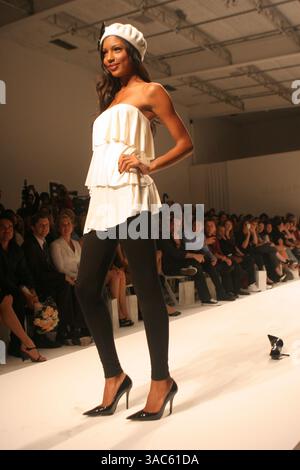 A model walks the runway at the Lauren Conrad Collection show during ...