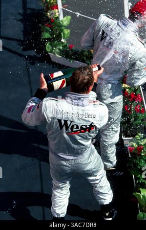 L to R): Mika Hakkinen (FIN) McLaren and David Coulthard (GBR) McLaren ...
