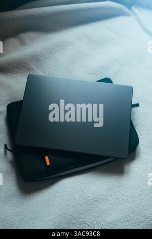 A flat lay of a cozy office room with blinds on the windows, a wooden ...