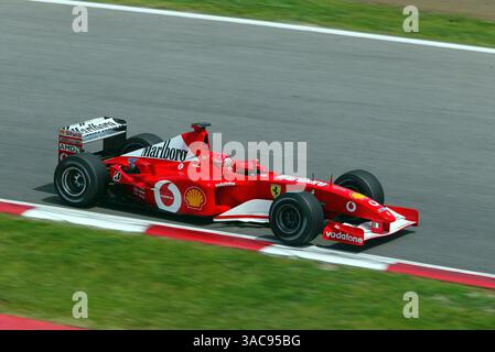 Michael Schumacher (GER) Ferrari F2002, takes the 150th GP victory for ...